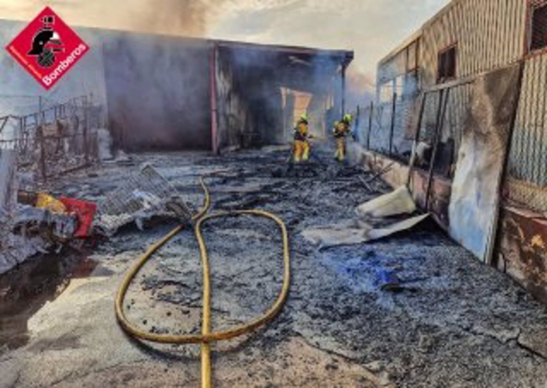 Large amounts of smoke from a pallet warehouse fire